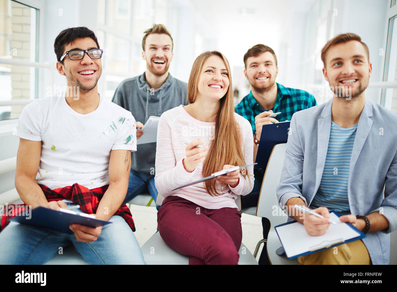 Listening to lecture Stock Photo - Alamy