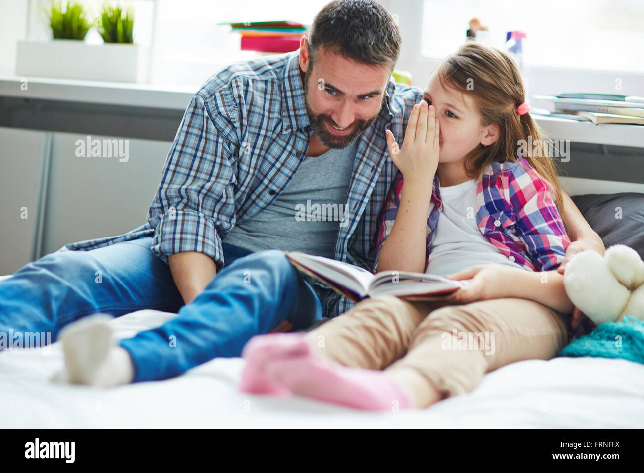 Telling secret hi-res stock photography and images - Alamy