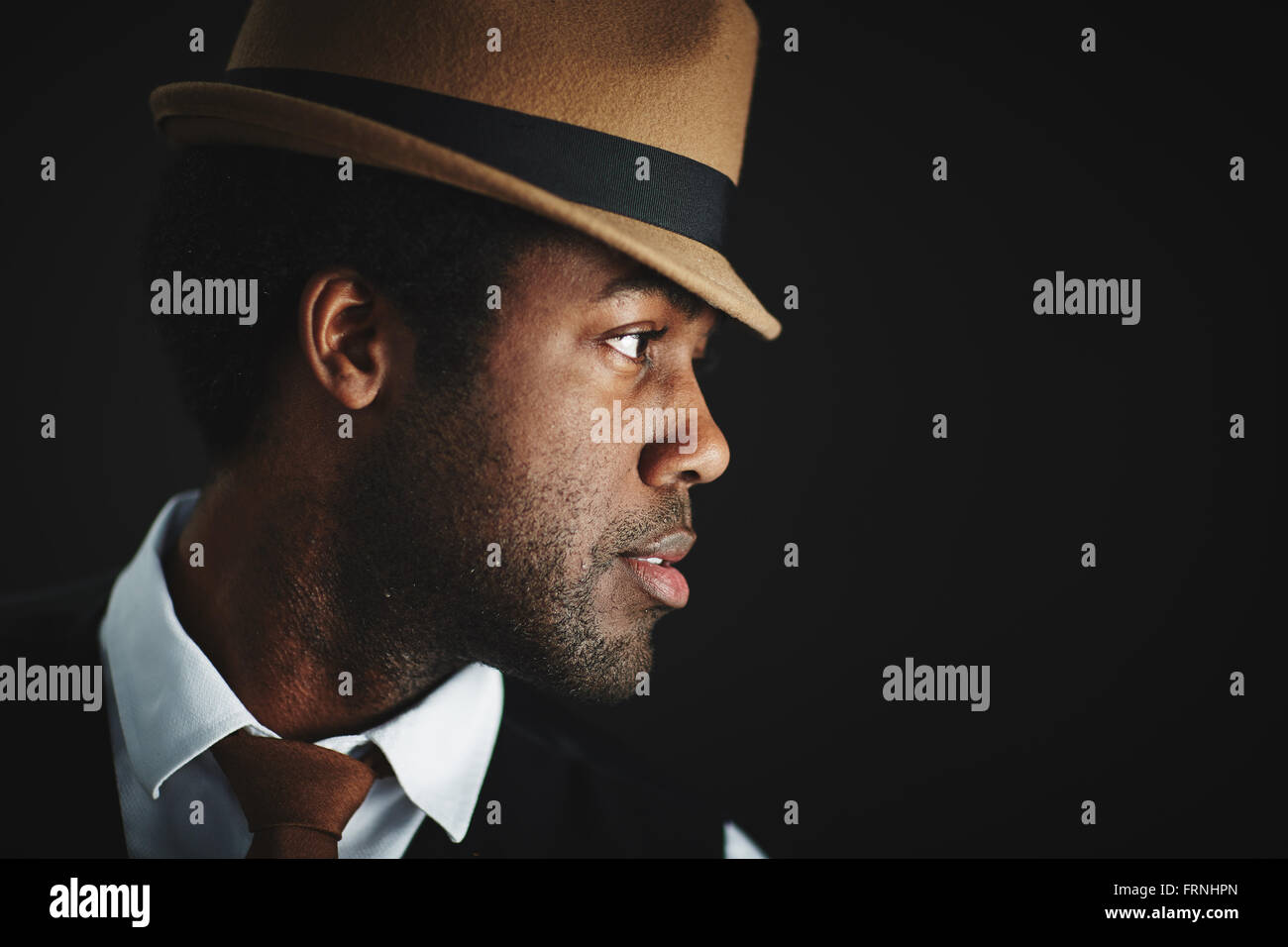 Black man posing Stock Photo - Alamy