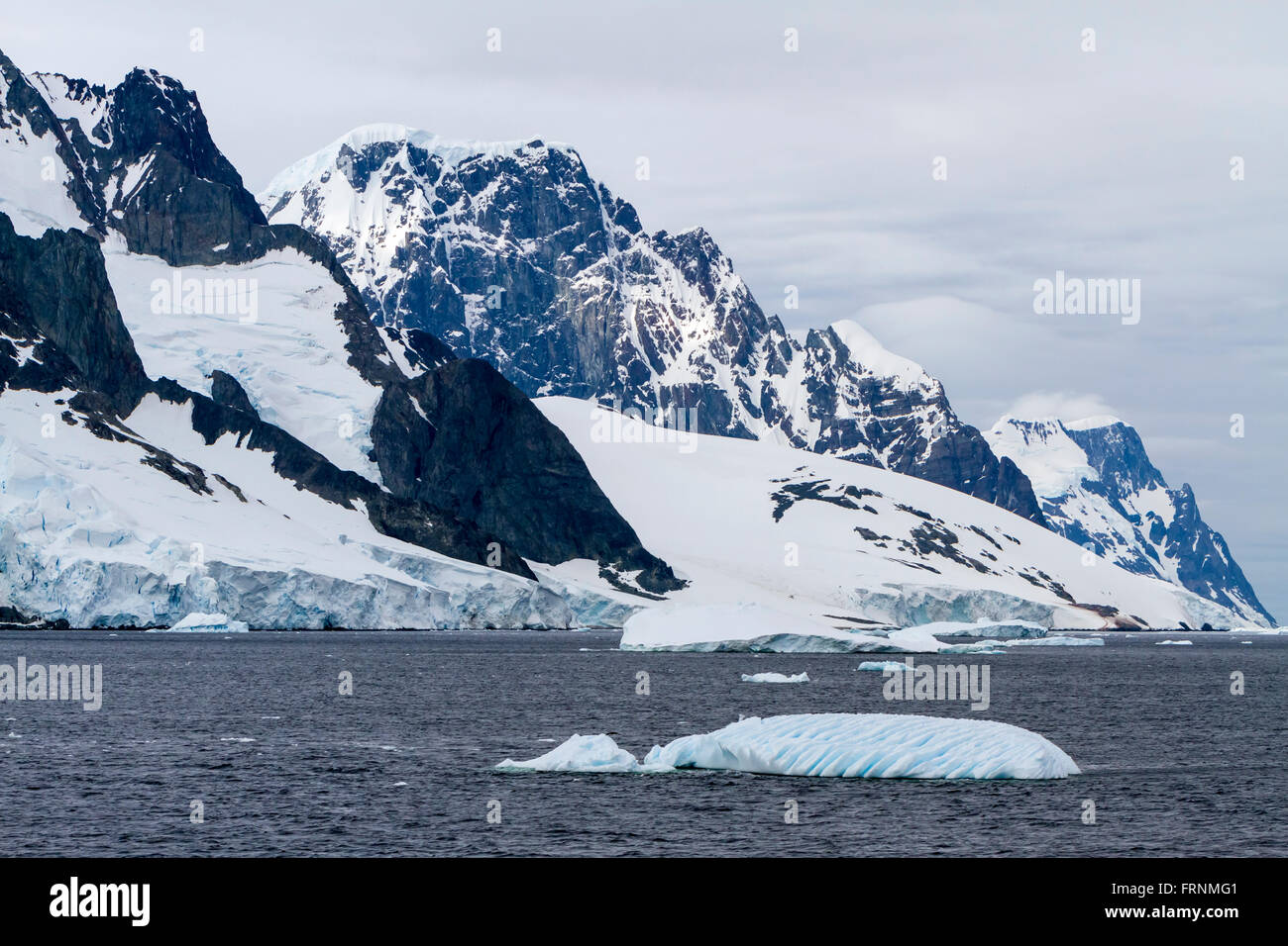 Rugged mountains with ice and snow in the Antarctic Peninsula ...