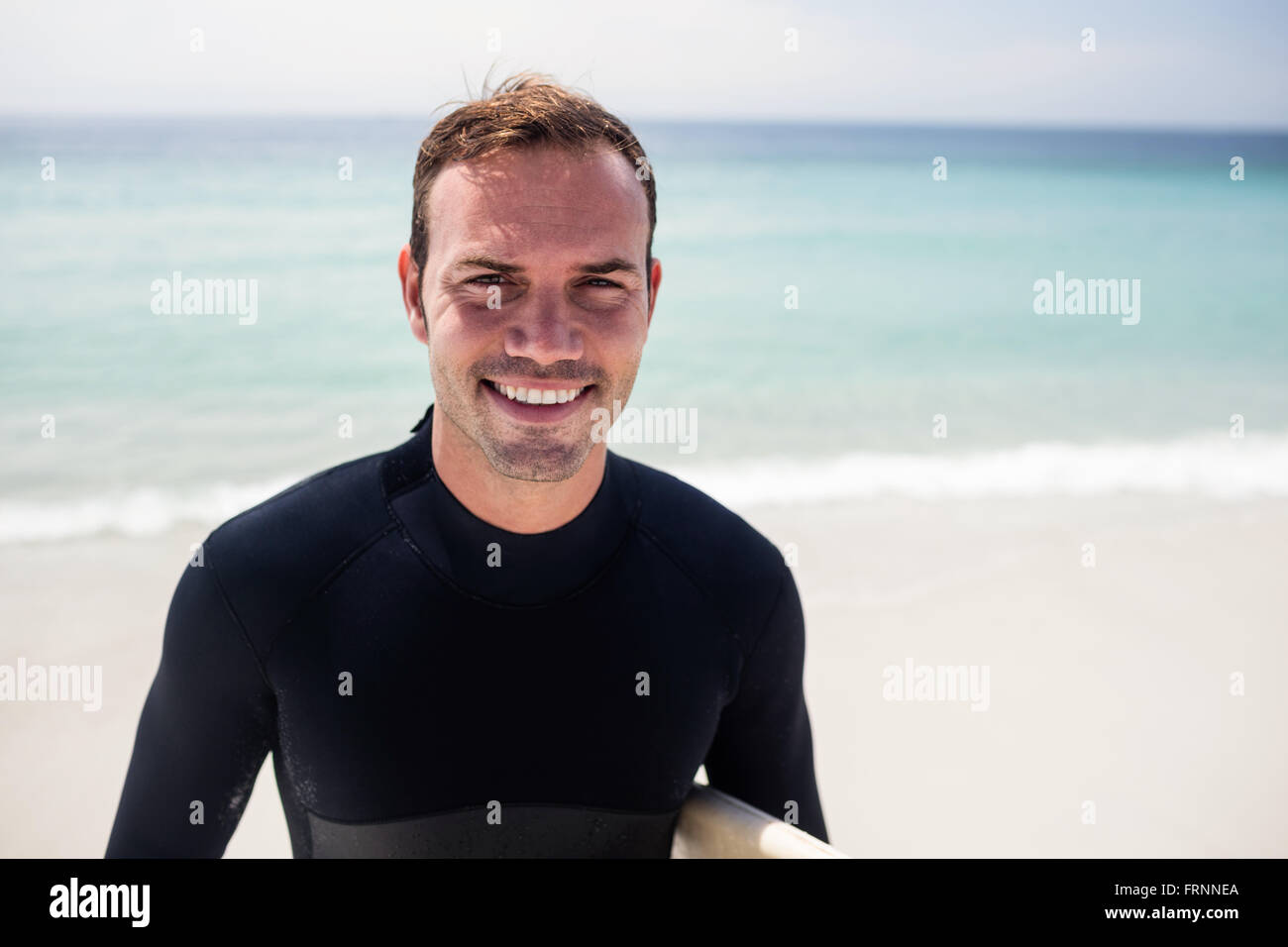 Surfer standing beach hi-res stock photography and images - Alamy