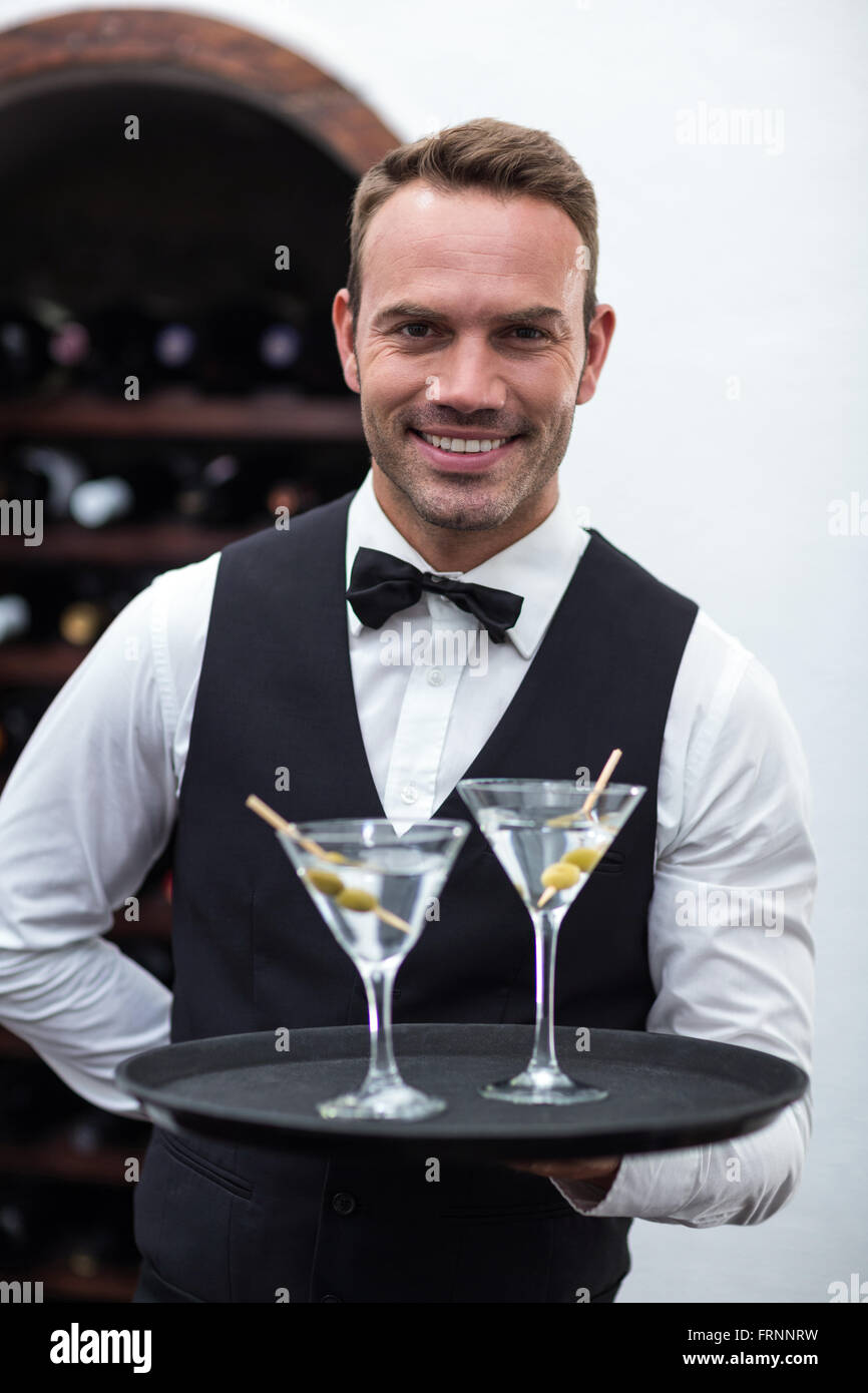 Waiter with tray of cocktails Stock Photo - Alamy