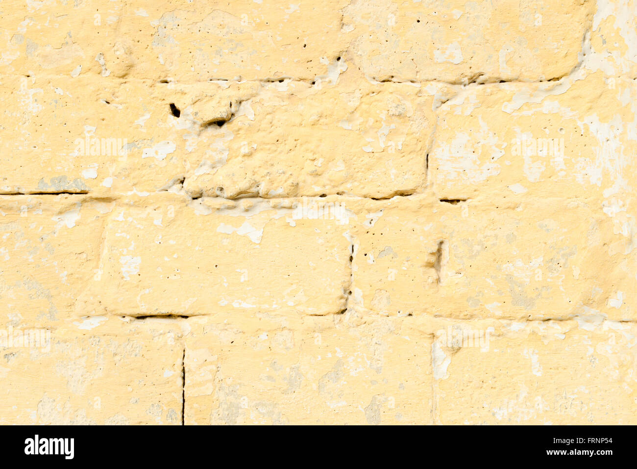 Yellow stone wall texture hi-res stock photography and images - Alamy