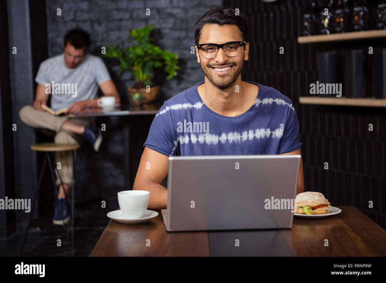 Man laptop computer sandwich hi-res stock photography and images - Alamy