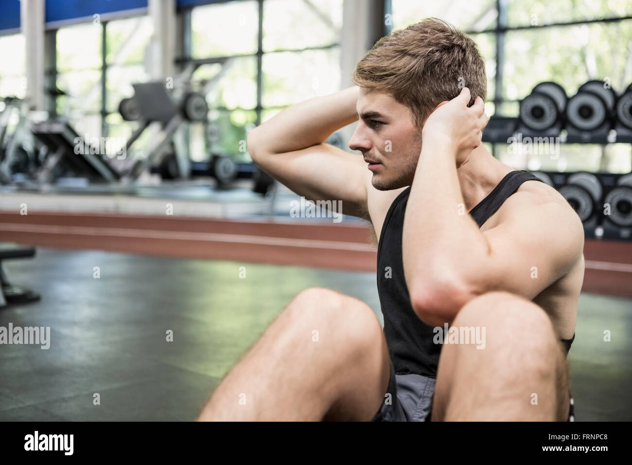Man doing abdominal crunches Stock Photo - Alamy
