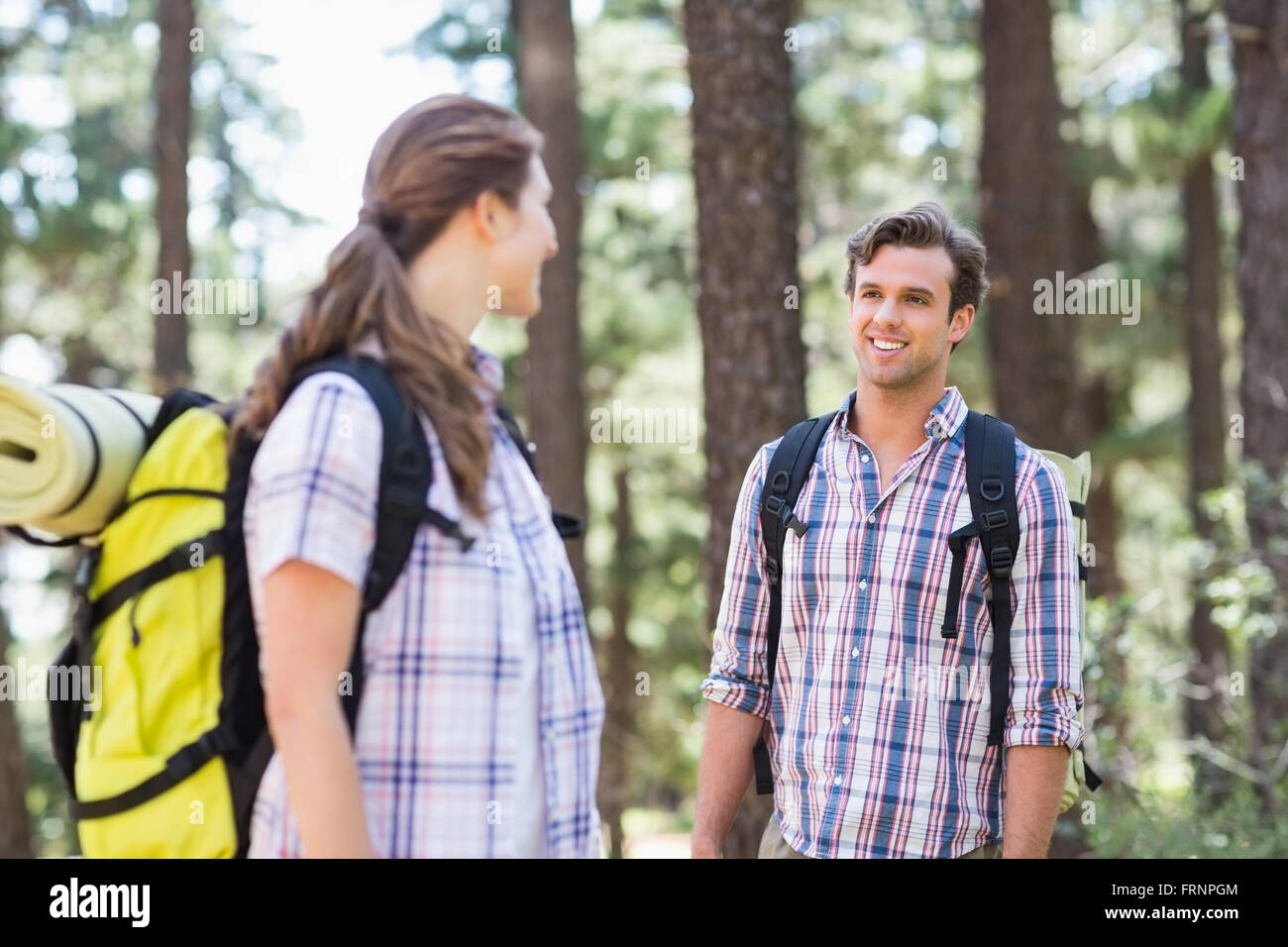 Young woman looking at partner Stock Photo - Alamy