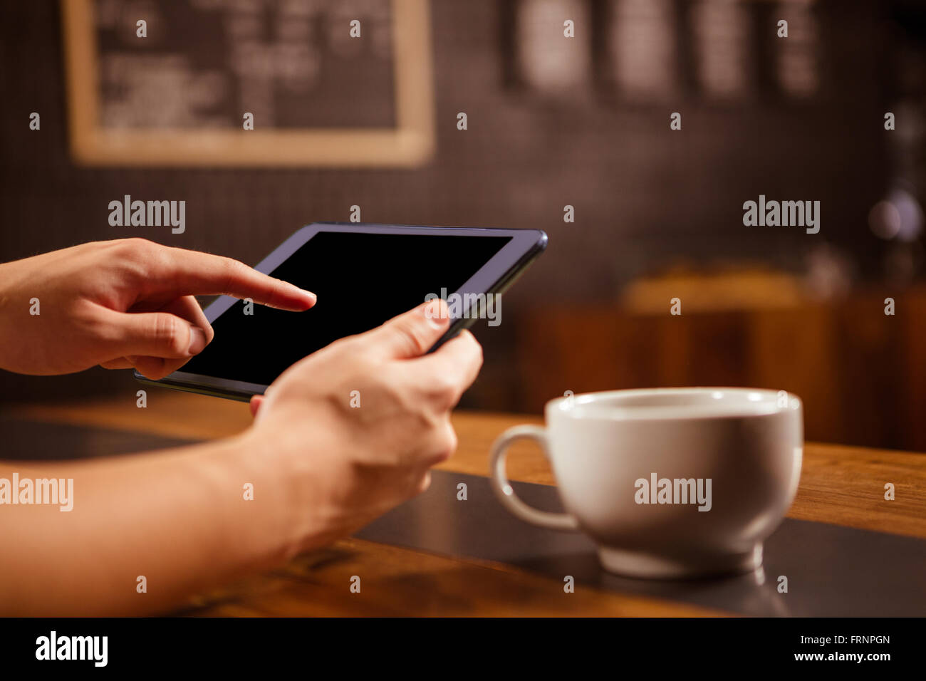 Close-up of person using tablet Stock Photo - Alamy