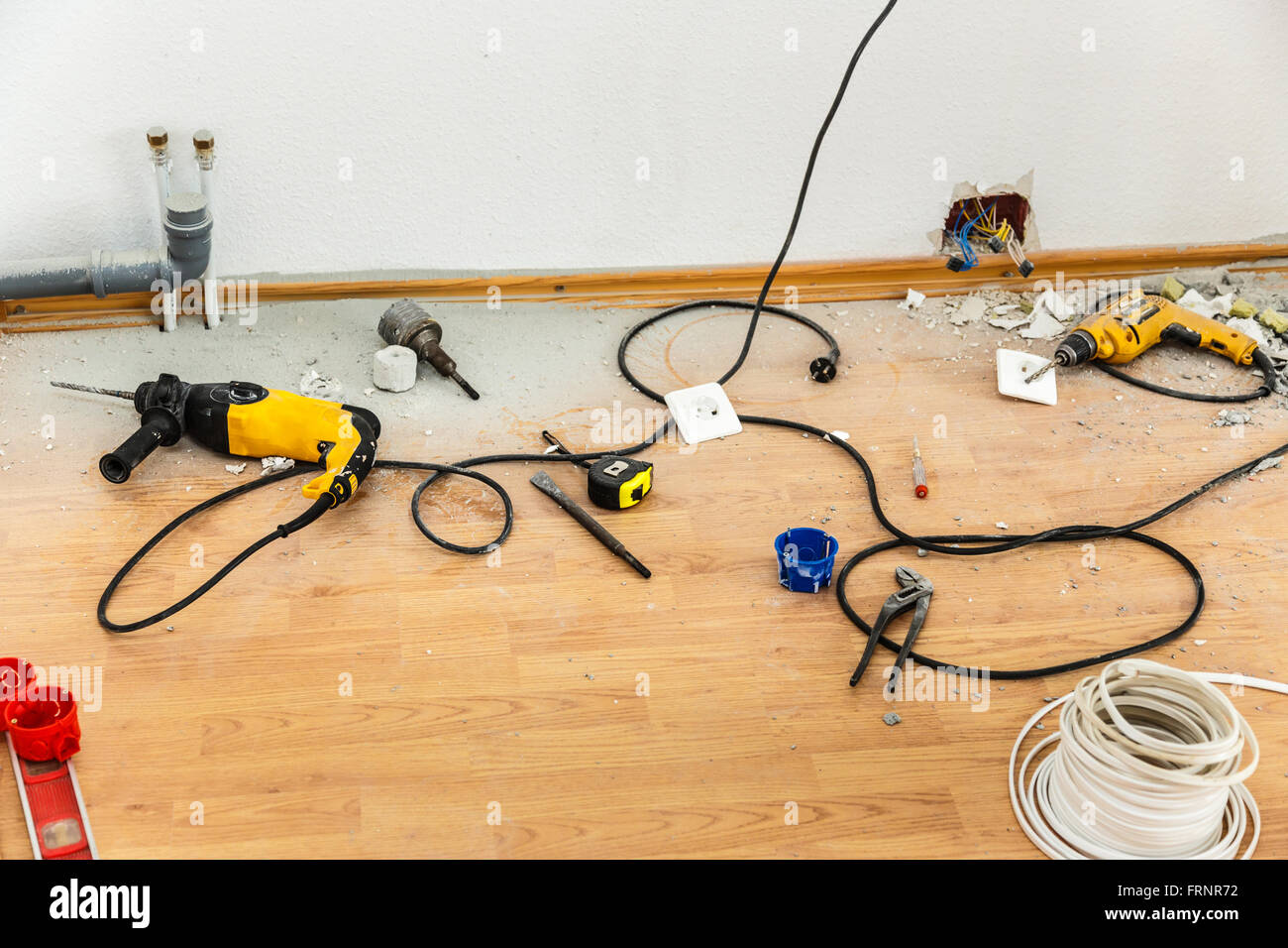 Place of electric socket repair process with drill Stock Photo - Alamy