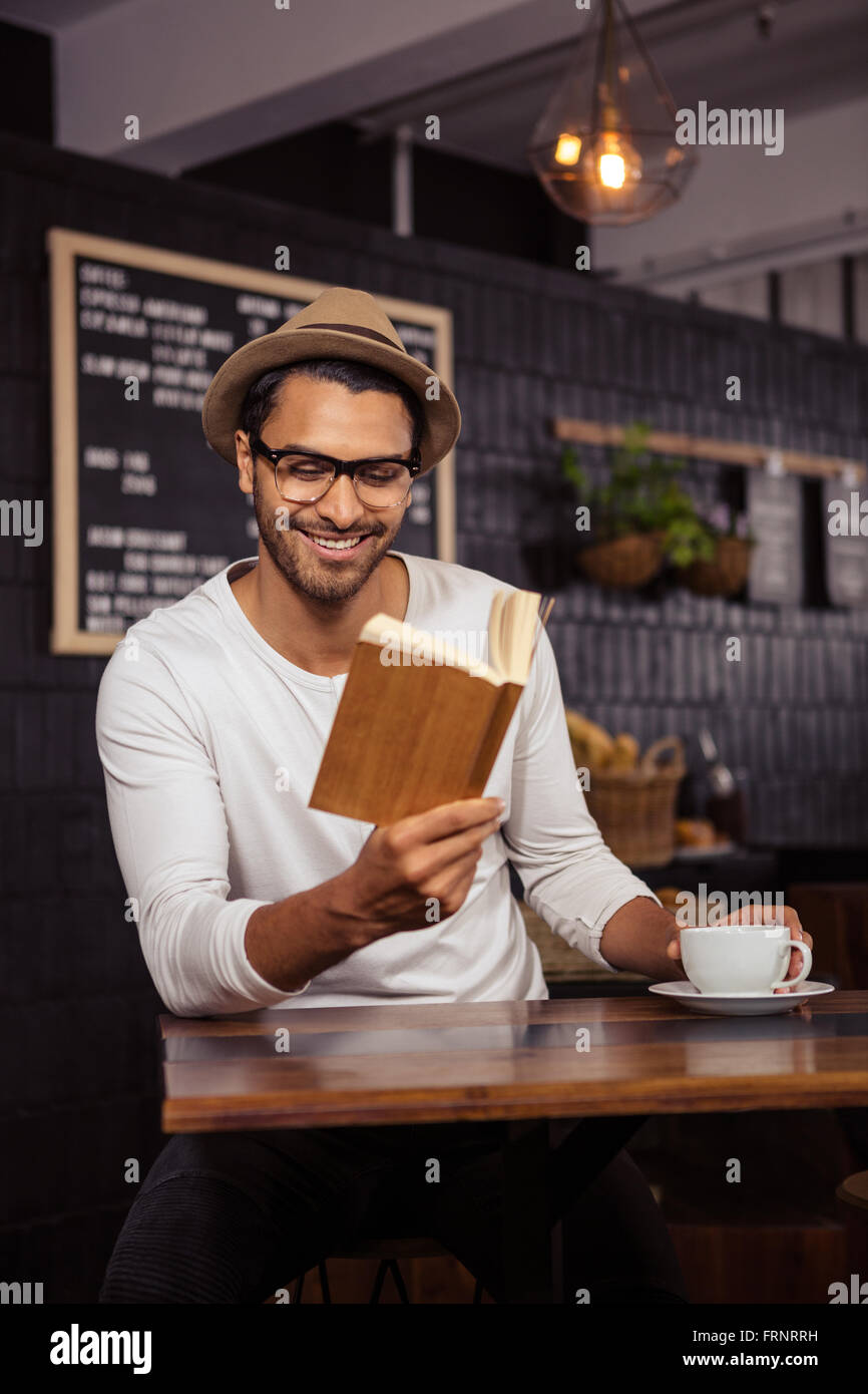 Man reading a book Stock Photo - Alamy