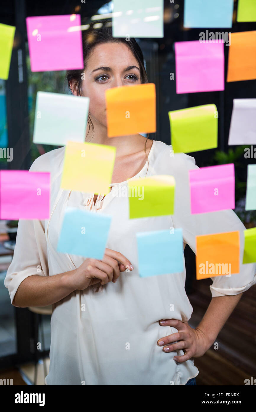 Looking at note hi-res stock photography and images - Alamy