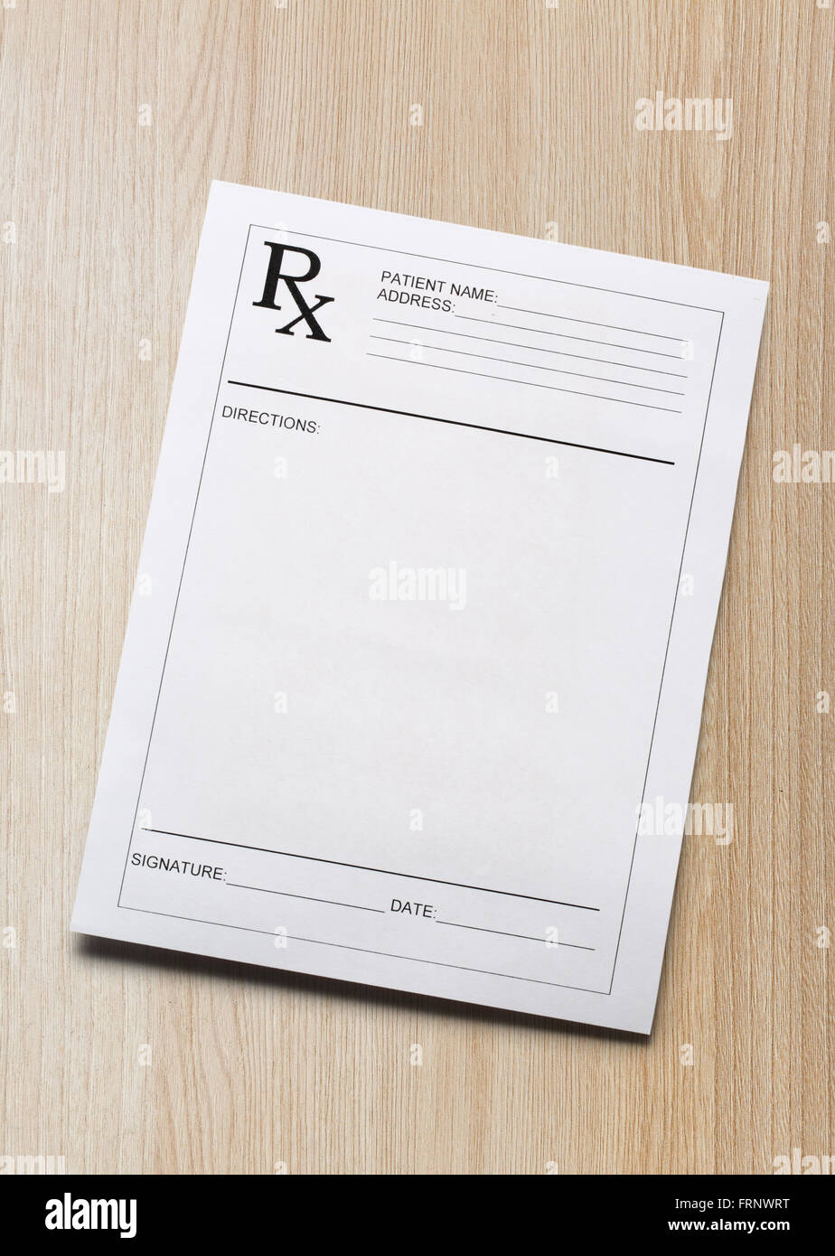 Single blank patient list on wooden background Stock Photo - Alamy