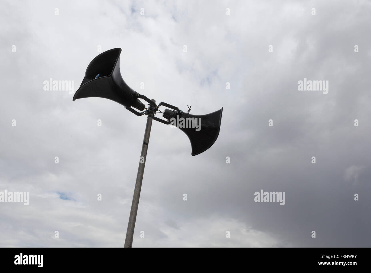 A public address or PA horn on a pole Stock Photo - Alamy