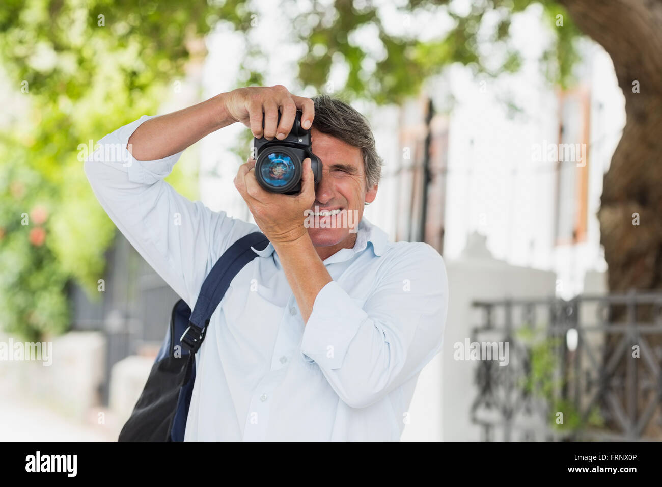 Man photographing from camera Stock Photo - Alamy