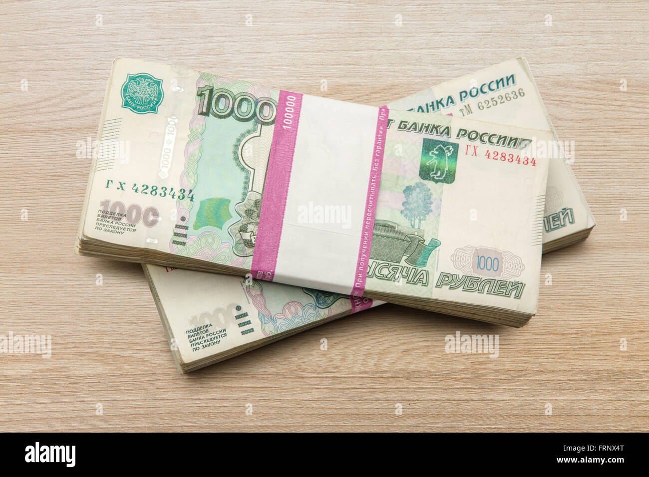 Pile money in wrapper in hi-res stock photography and images - Alamy