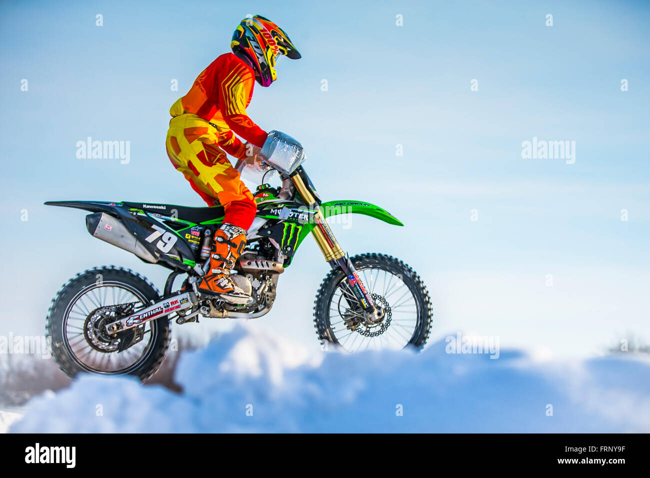 closeup rider on a motorcycle jump on mountain during Cup Winter ...