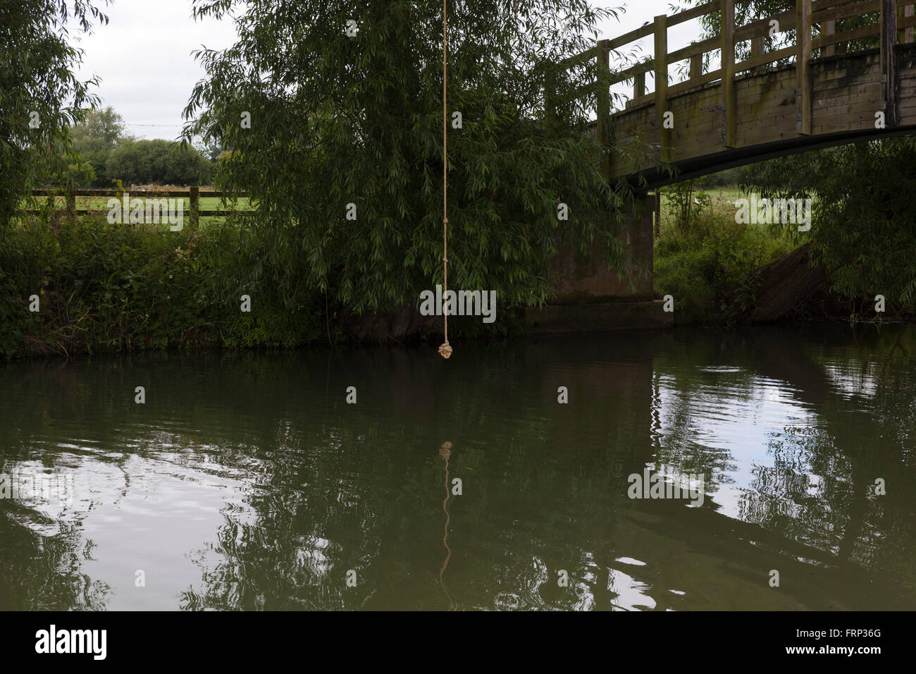Kids swing over river hi-res stock photography and images - Alamy
