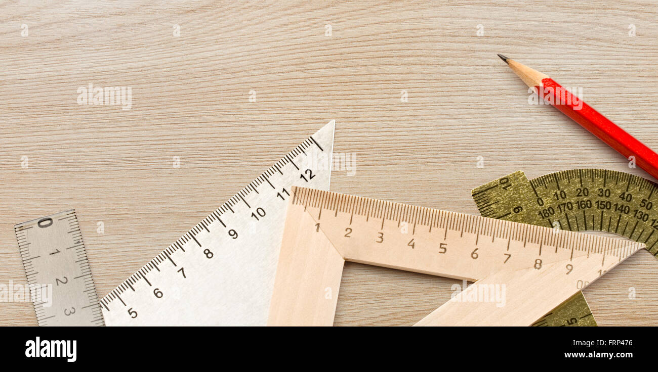 Drafting wooden and steel tools with pencil in closeup Stock Photo - Alamy