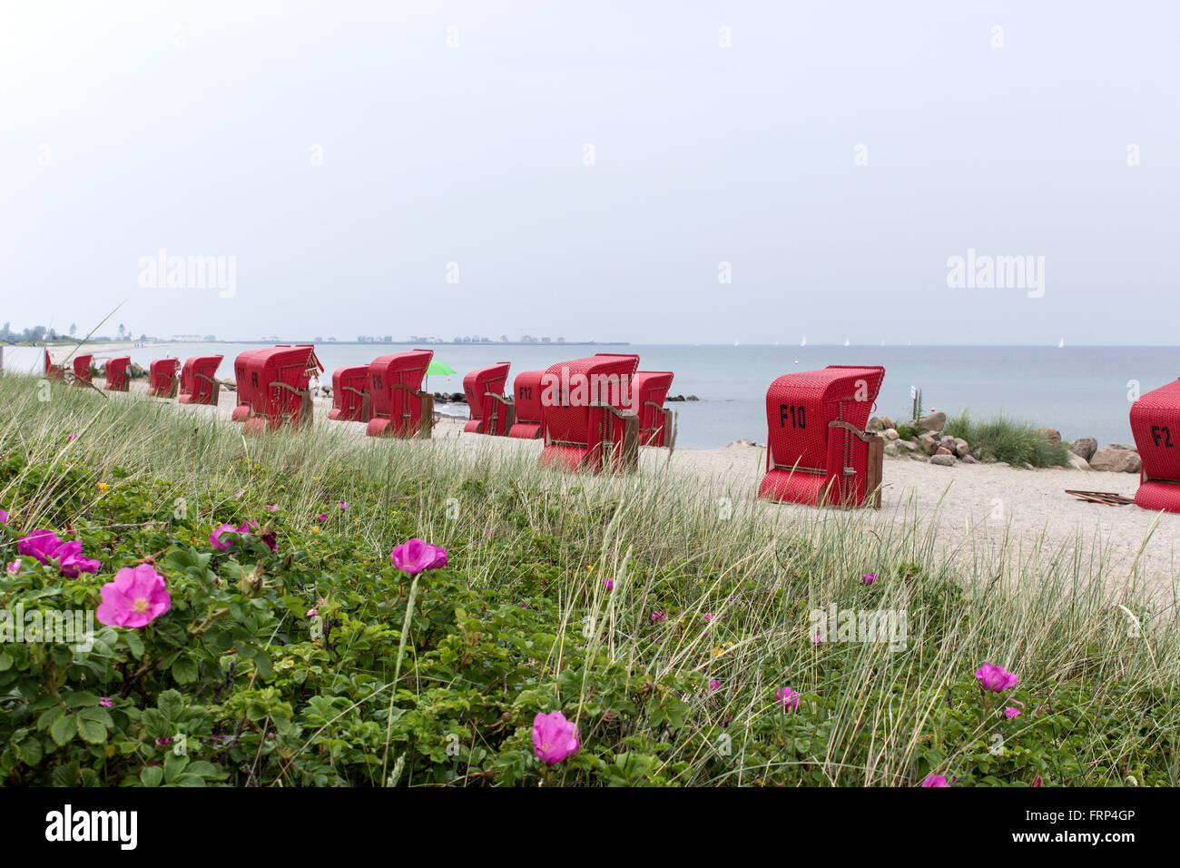 Red beach chair ocean hi-res stock photography and images - Alamy