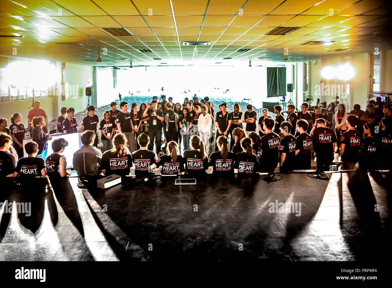 Crowd of people gathered in front of a stage before an event Stock ...