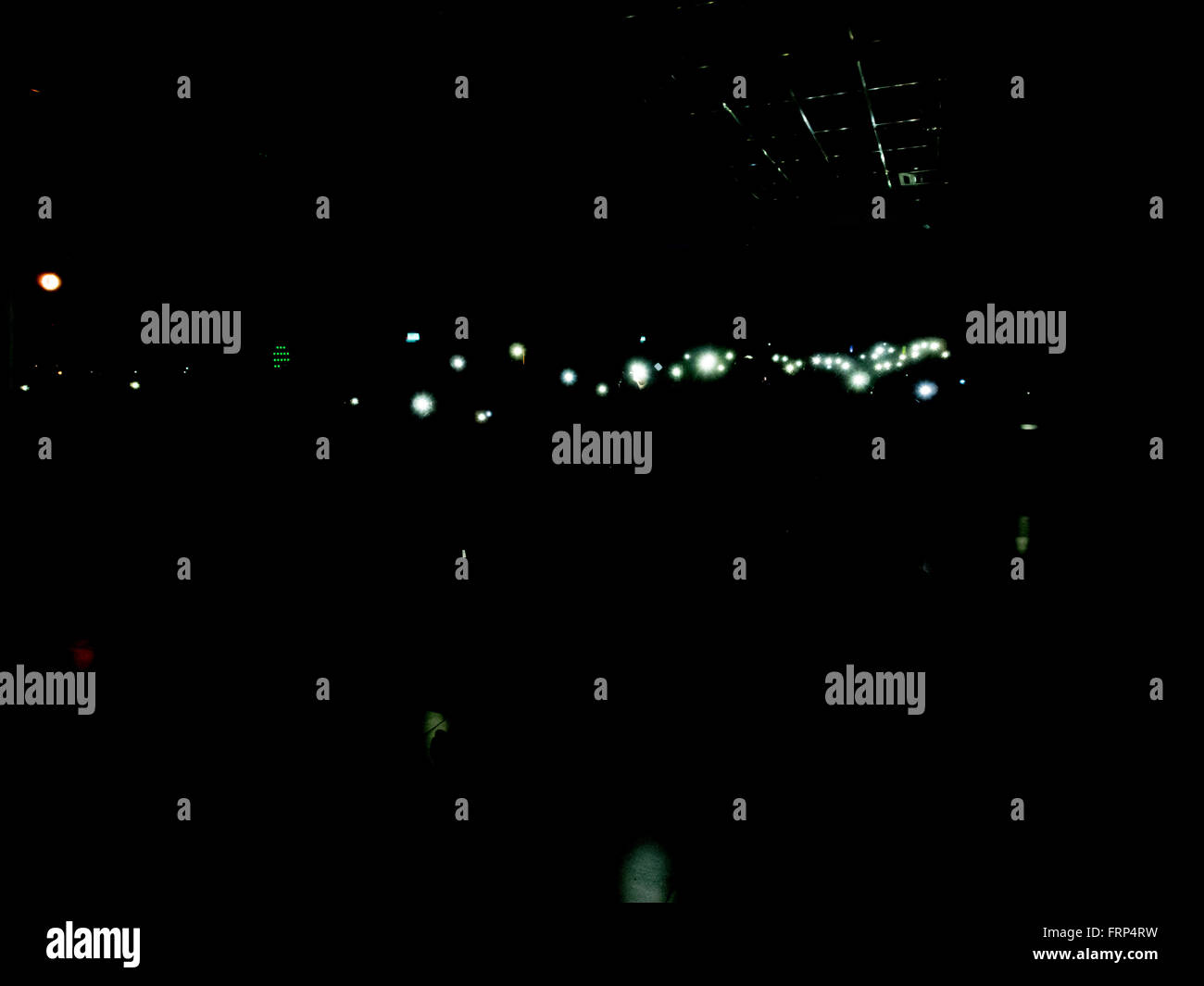 Spots of light floating in a pitch dark room Stock Photo - Alamy
