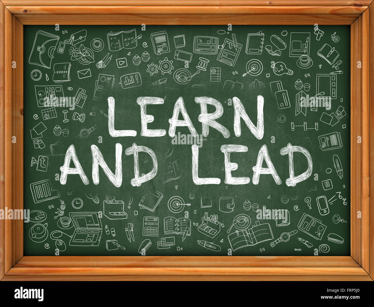 Green Chalkboard with Hand Drawn Learn and Lead Stock Photo - Alamy