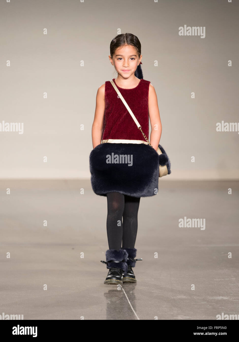 New York, NY USA - March 12, 2016: Young model walks runway for IMOGA ...