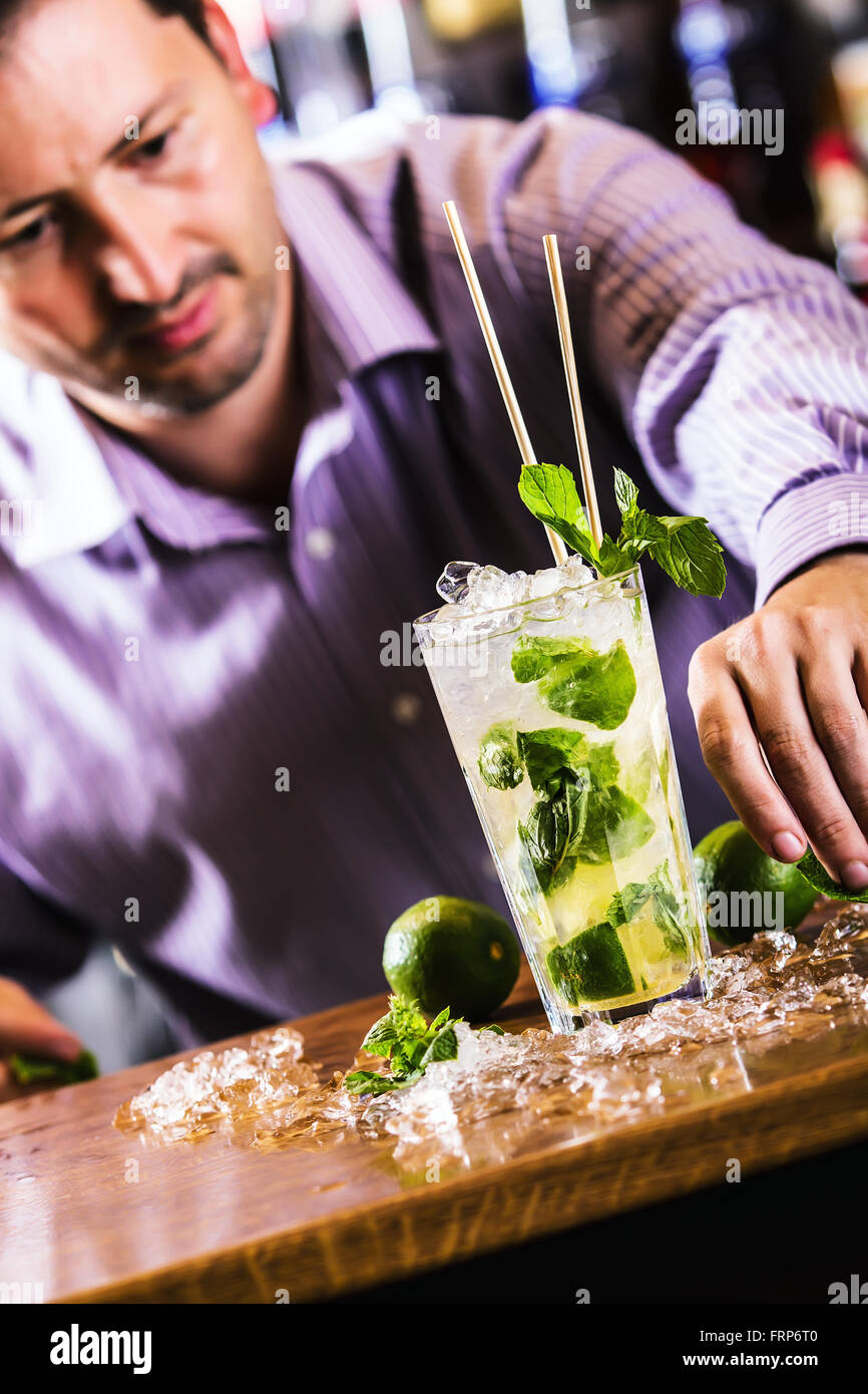 Mojito.Bartender in night pub preparing alcoholic drink mojito Stock ...