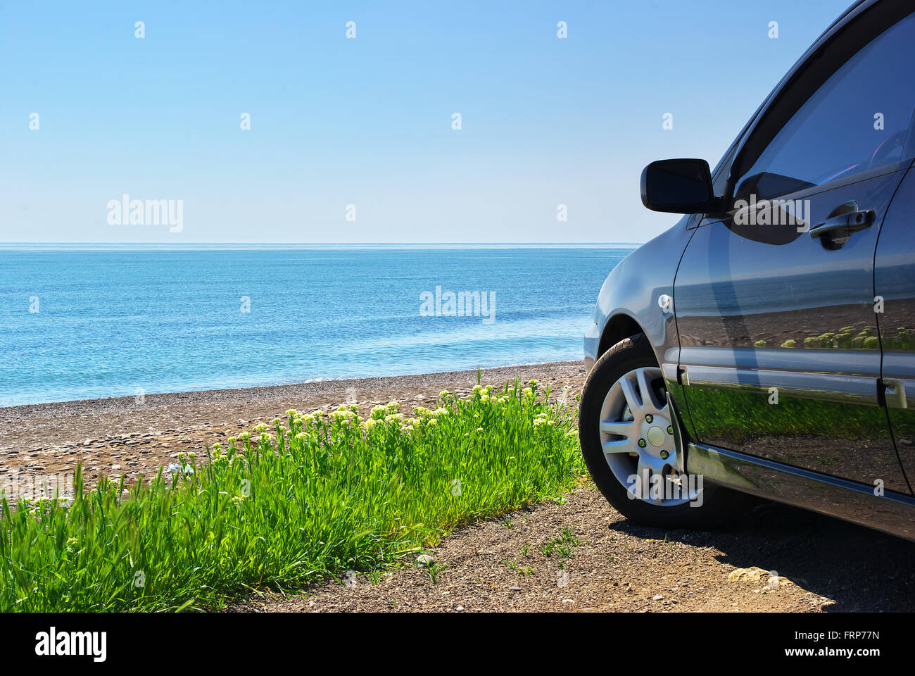 Black car on sea beach hi-res stock photography and images - Alamy
