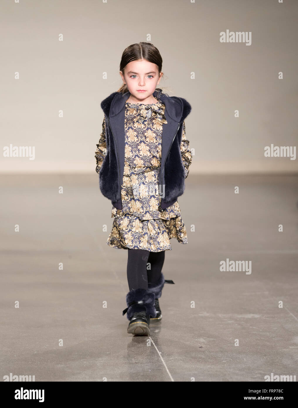 New York, NY USA - March 12, 2016: Young model walks runway for IMOGA ...