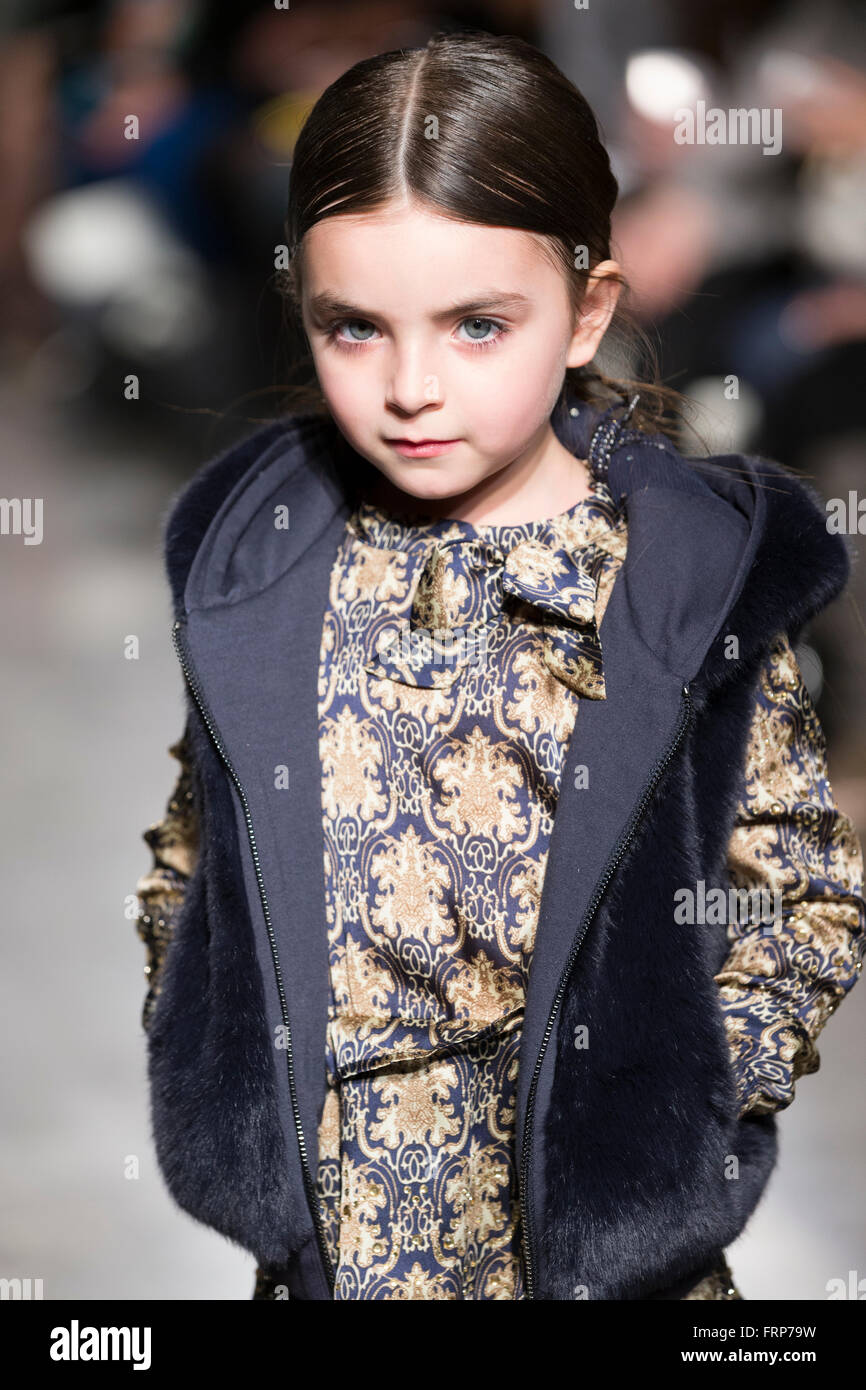 New York, NY USA - March 12, 2016: Young model walks runway for IMOGA ...