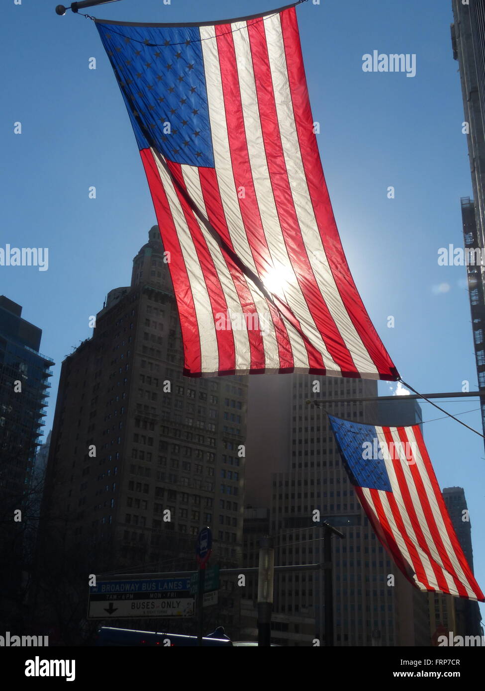 US flags hang at Wall Street Stock Photo - Alamy