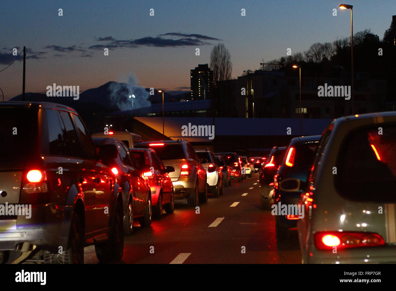 Heavy traffic in the evening commute in a city landscape Stock Photo ...