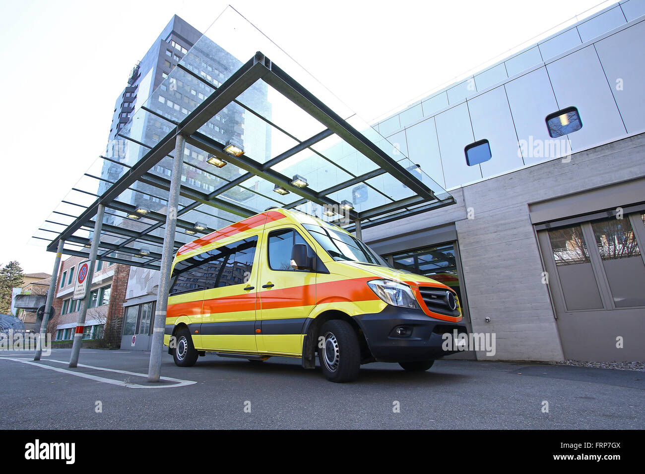 Emergency room entrance at a general hospital with ambulance parked in ...
