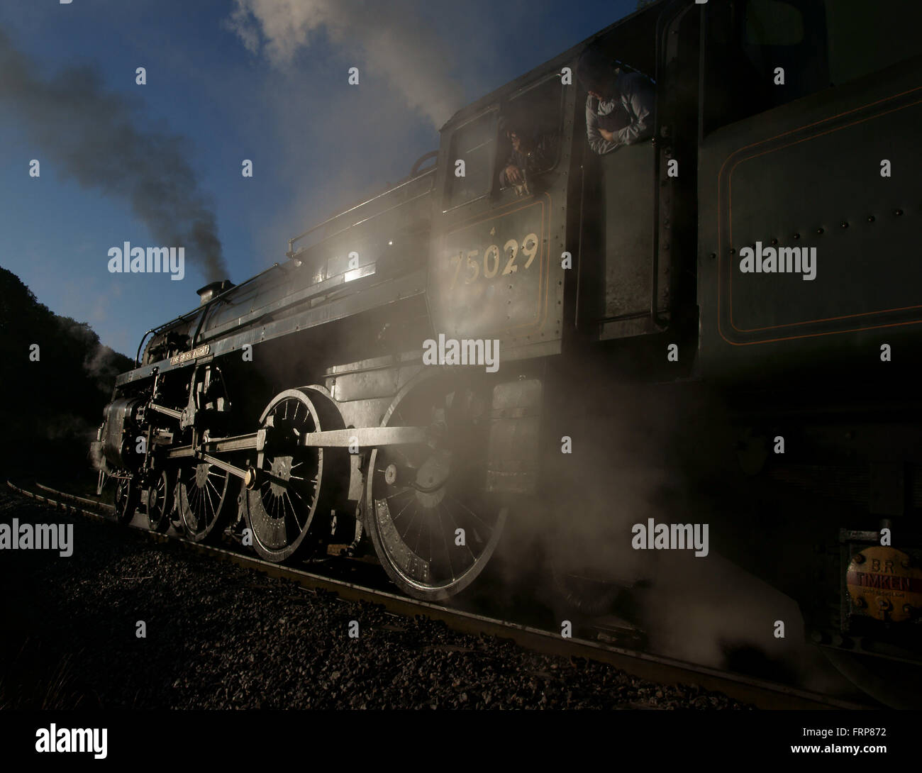 Steam locomotive 75029 Green Knight pictured in low sun Stock Photo - Alamy