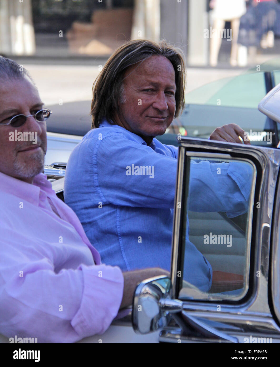 Mohamed Hadid and Shiva Safai cruise down Rodeo Dr. in a vintage ...