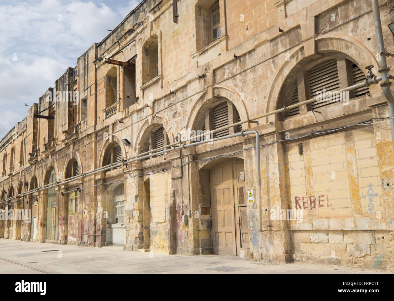 Dockside buildings at Dockyard Creek, Senglea in Malta Stock Photo - Alamy
