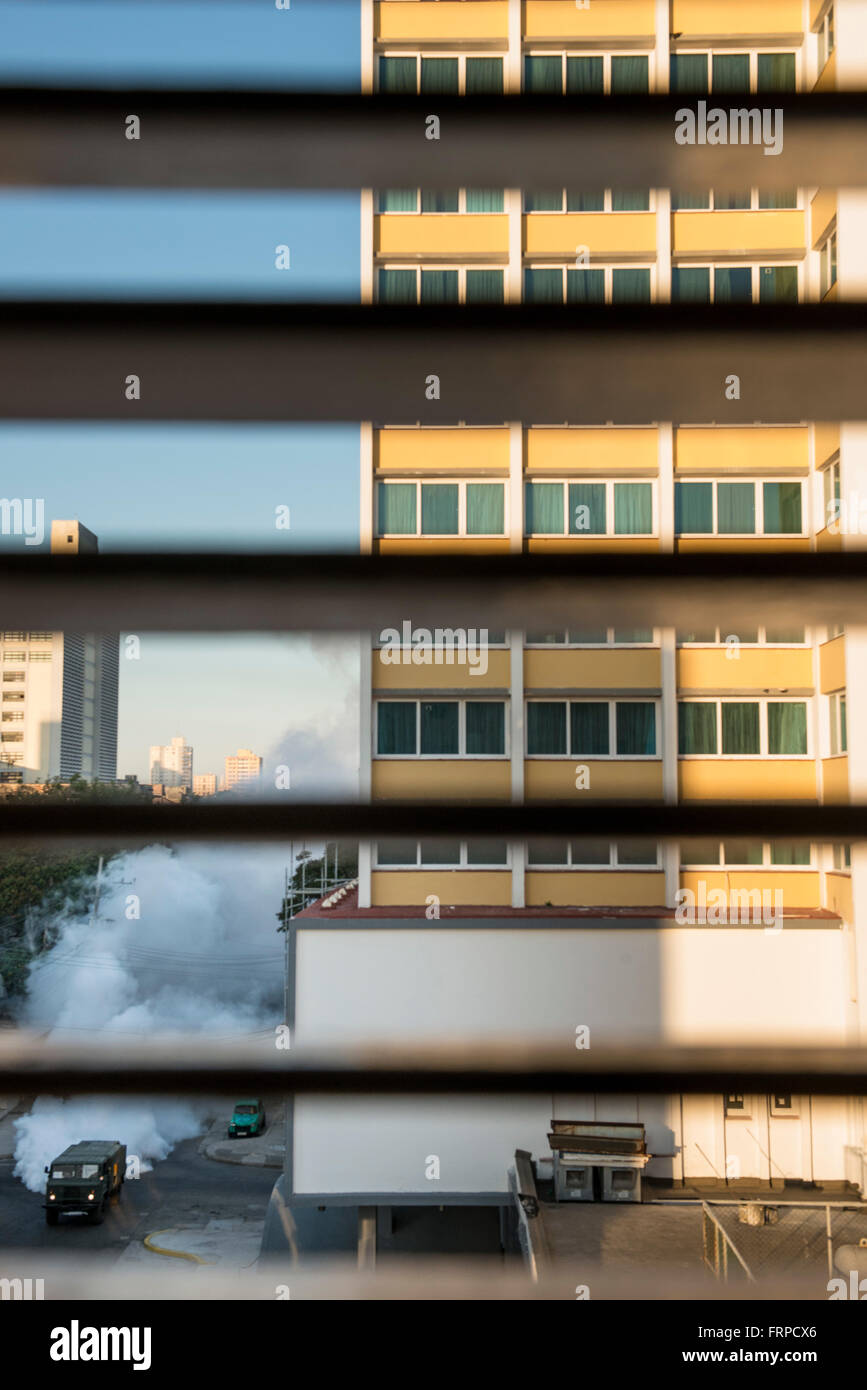 Fumigation Truck Spraying on Road, as Seen Through a Window - Vedado ...
