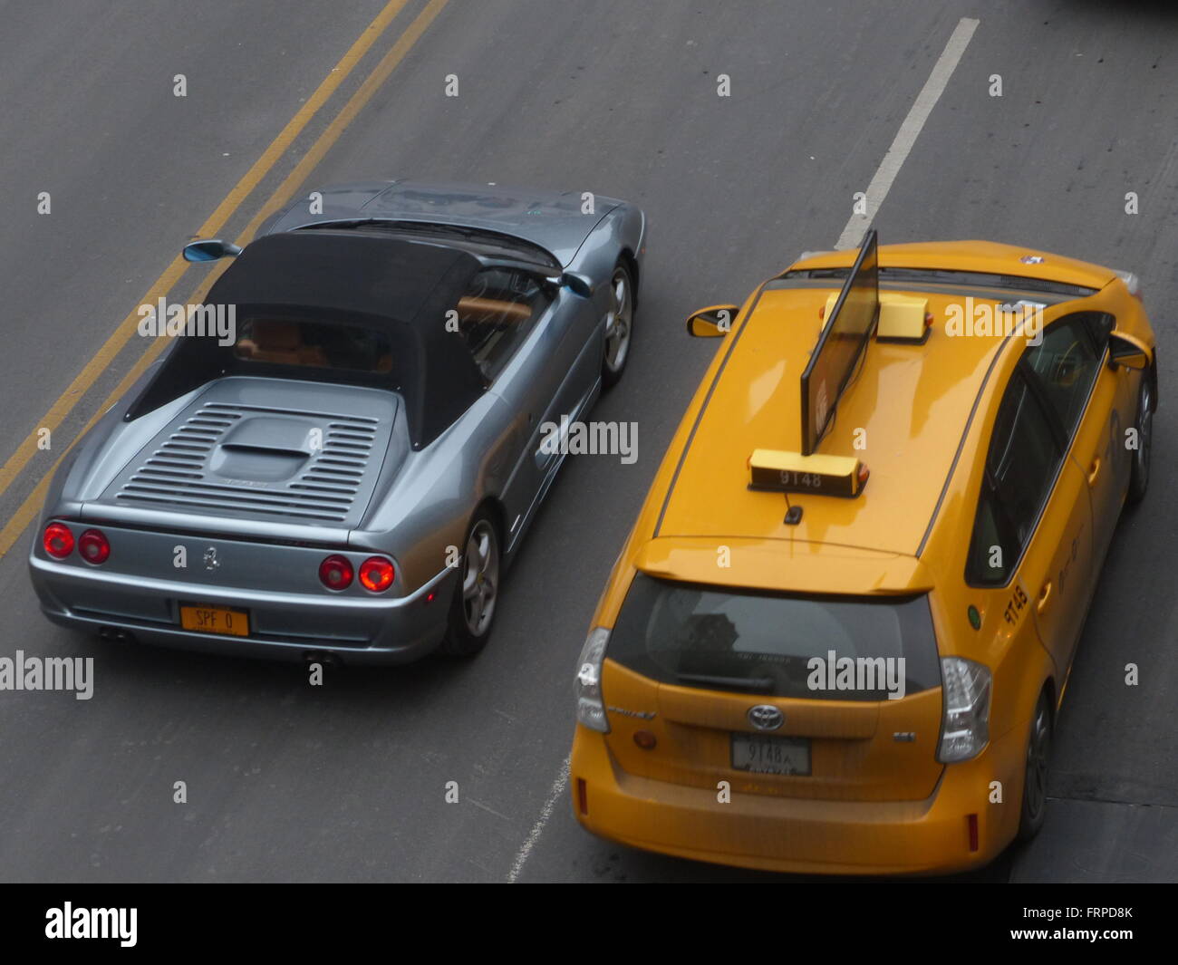 Ferrari with yellow cab hi-res stock photography and images - Alamy