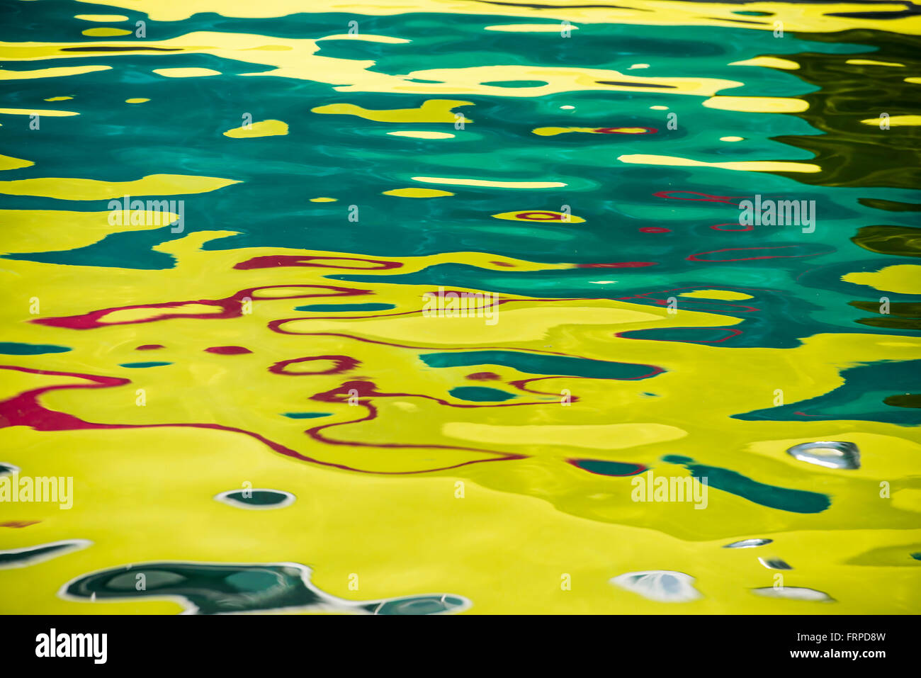 Colorful reflection on water Stock Photo - Alamy