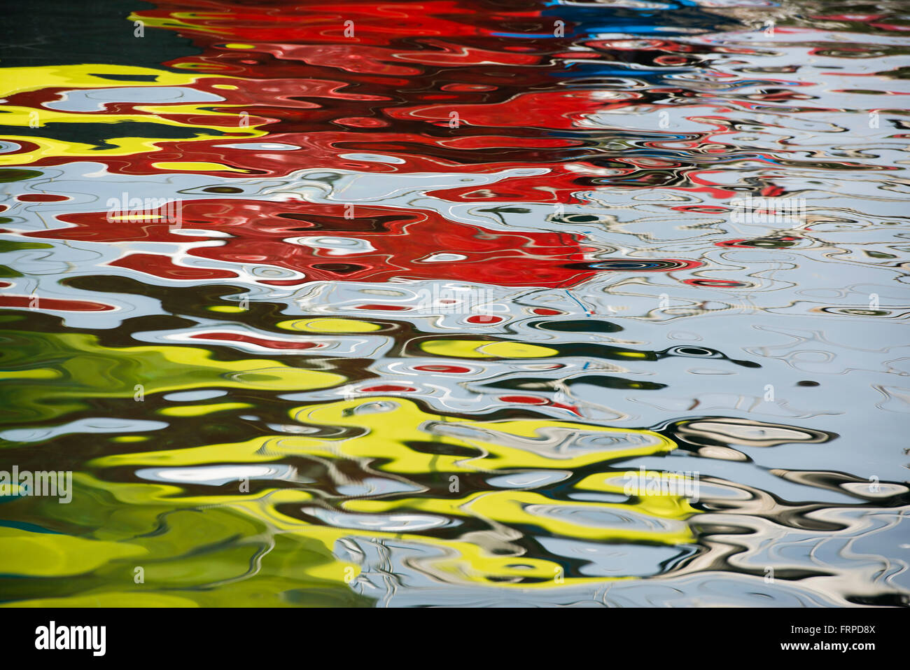 Colorful reflection on water Stock Photo - Alamy
