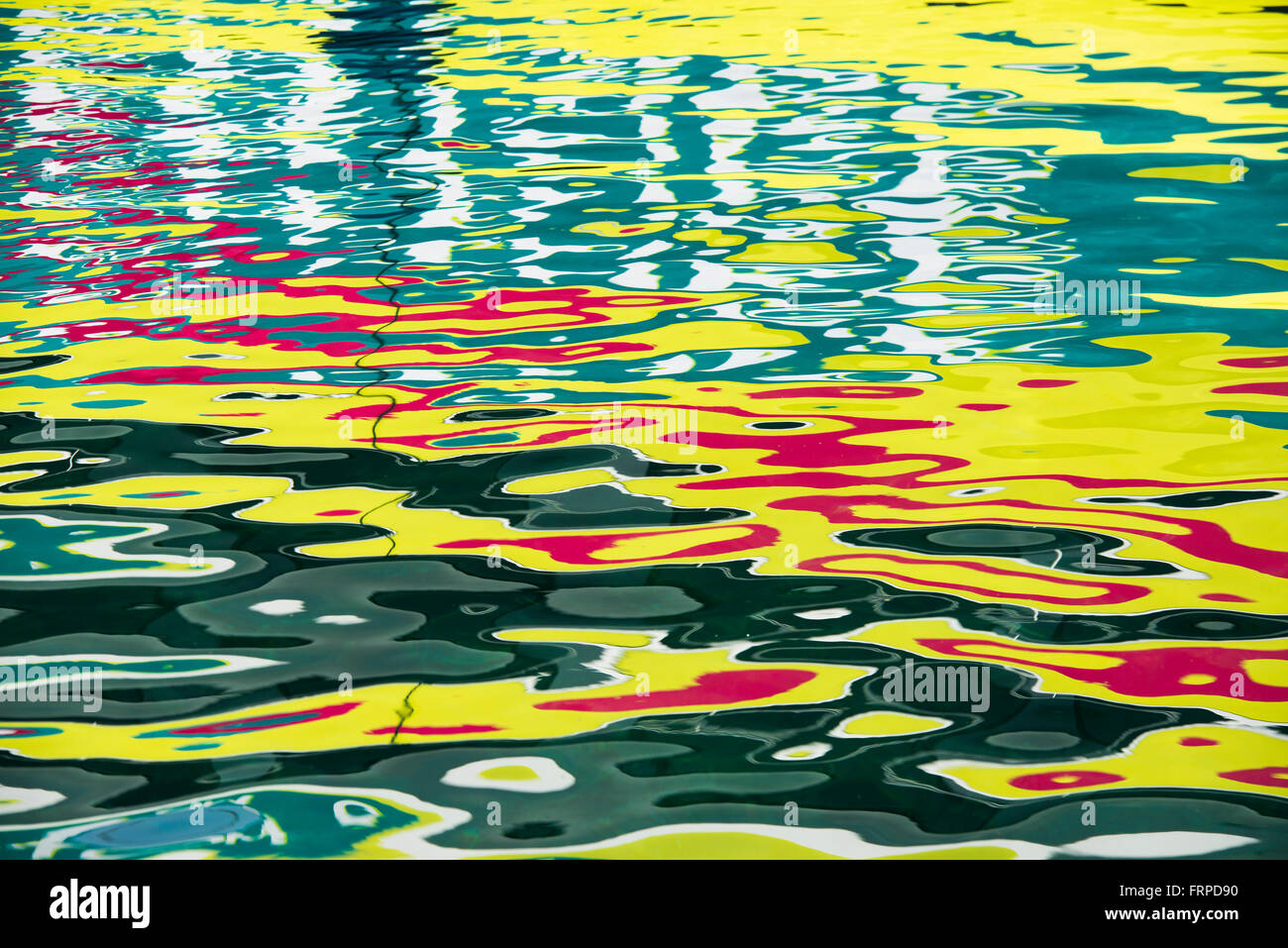 Colorful reflection on water Stock Photo - Alamy
