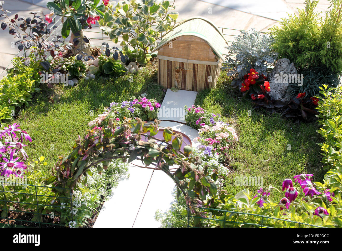 Mini garden on a cart displayed at Garden Festival, complete with hut ...