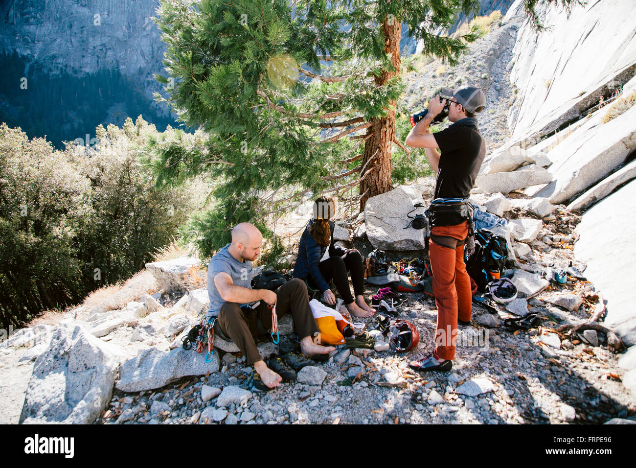 Climbers at the base of The Grack (5.6) in Yosemite Valley Stock Photo ...