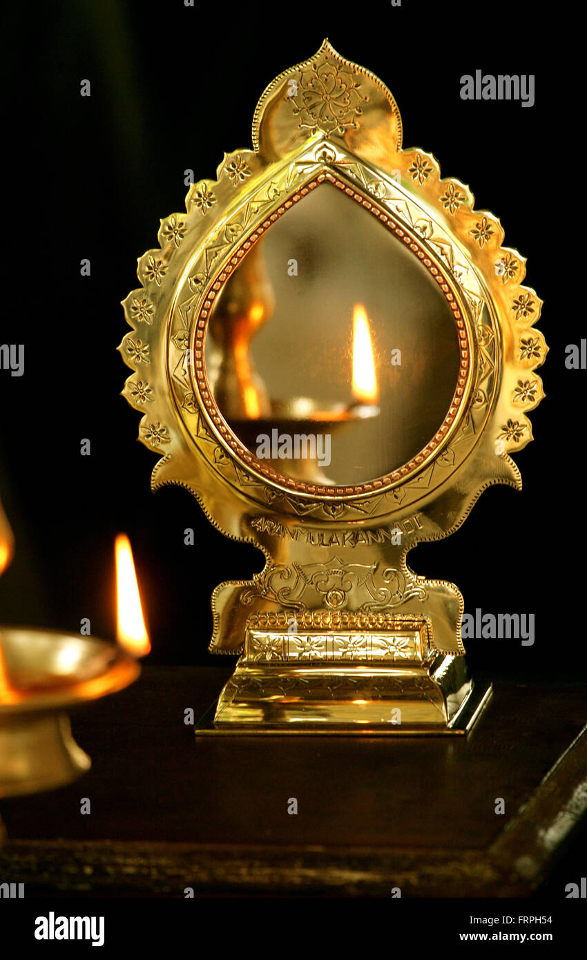 Aranmula kannadi ( Aranmula mirror) is a handmade metal-alloy mirror ...