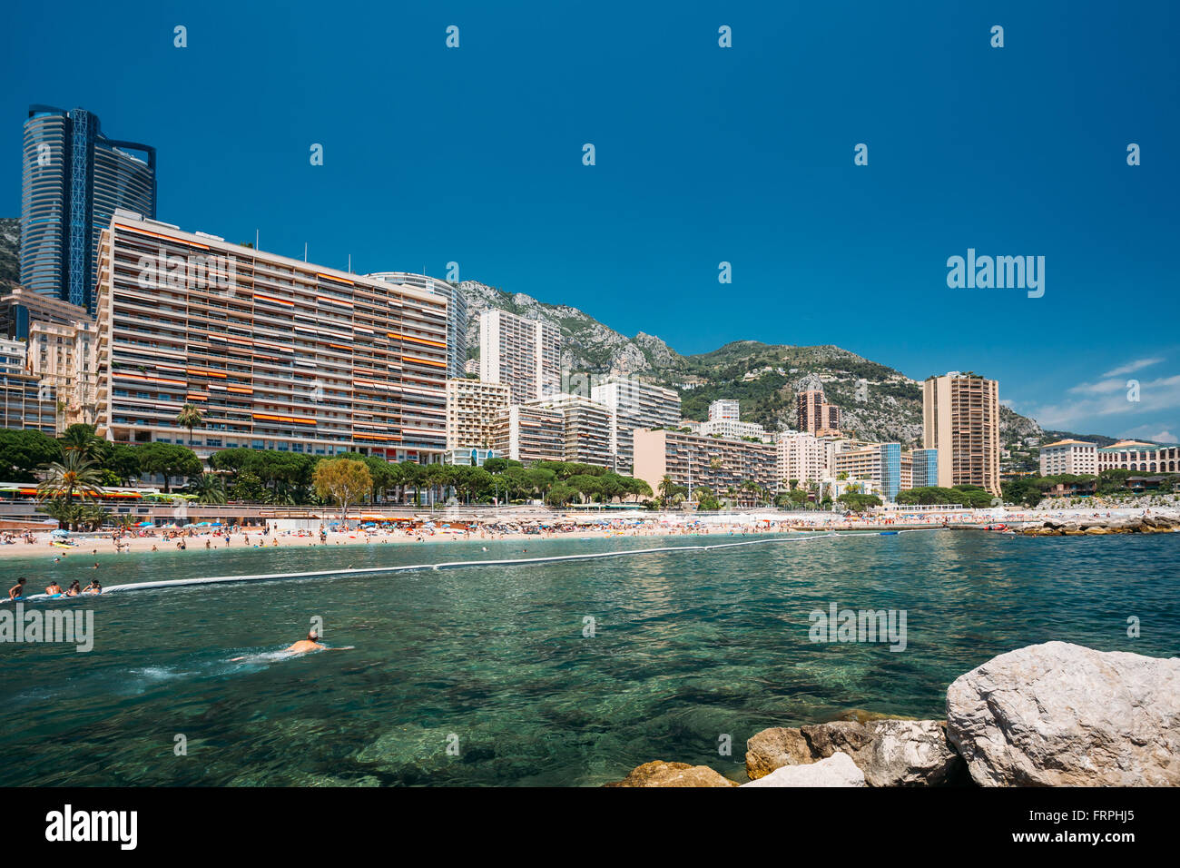 Scenic view of beach of city of Monte Carlo, Monaco. Sunny summer day ...