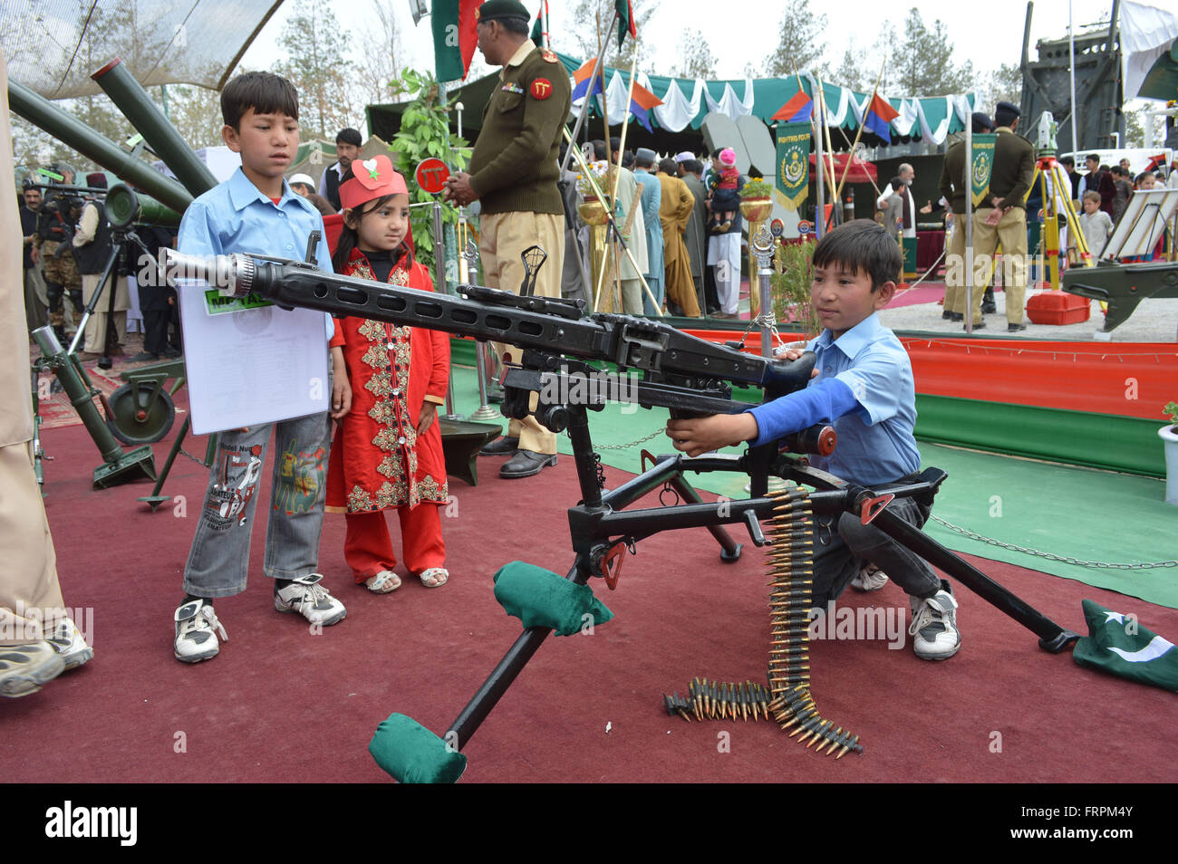 Quetta, Pakistan. 23rd Mar, 2016. A Pakistani boy poses for photos with ...