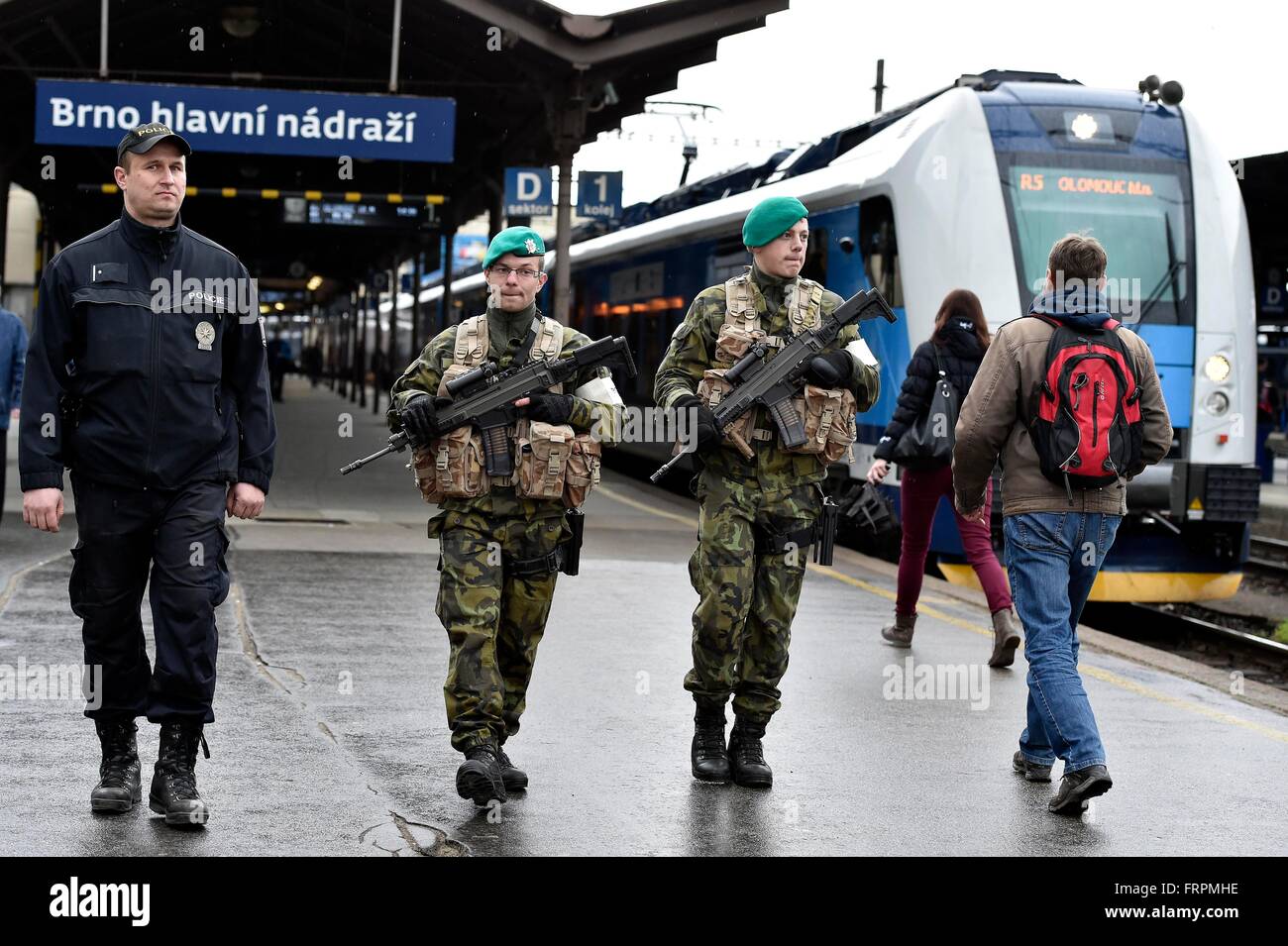 Brno, Czech Republic. 23rd Mar, 2016. Police officers with soldiers ...