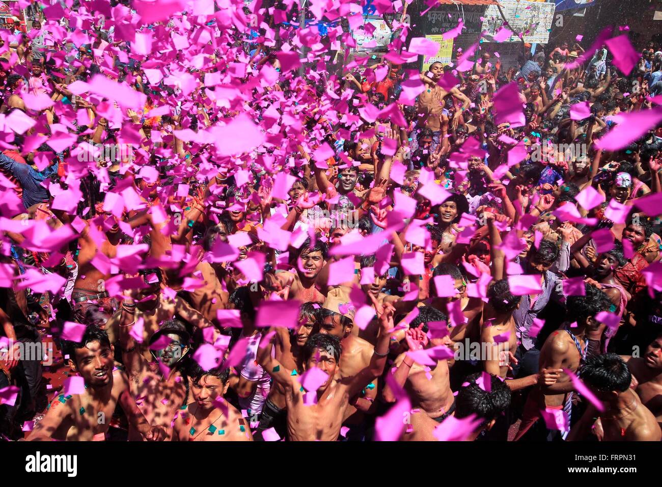 Allahabad, India. 23rd Mar, 2016. Revelers' faces smeared with colors ...