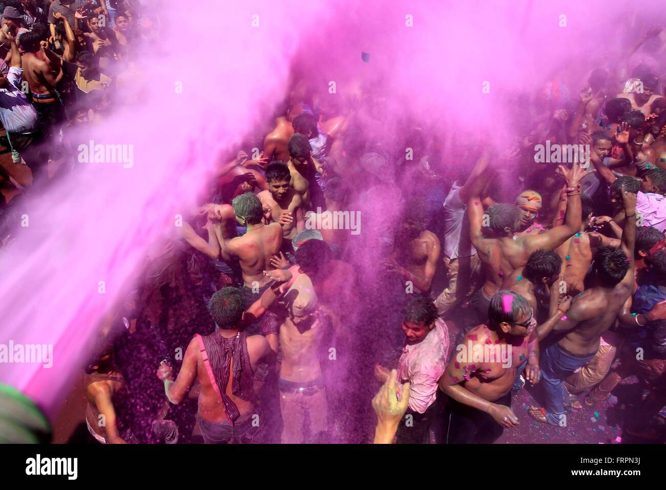 Allahabad, India. 23rd Mar, 2016. Revelers' faces smeared with colors ...