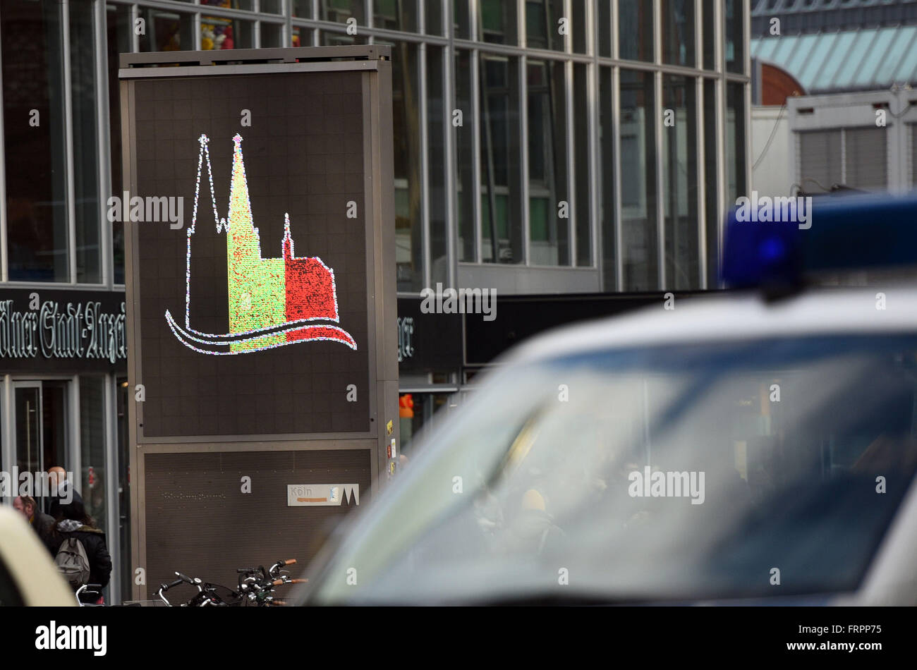 Cologne, Germany. 23rd Mar, 2016. An advertising board shows a picture ...